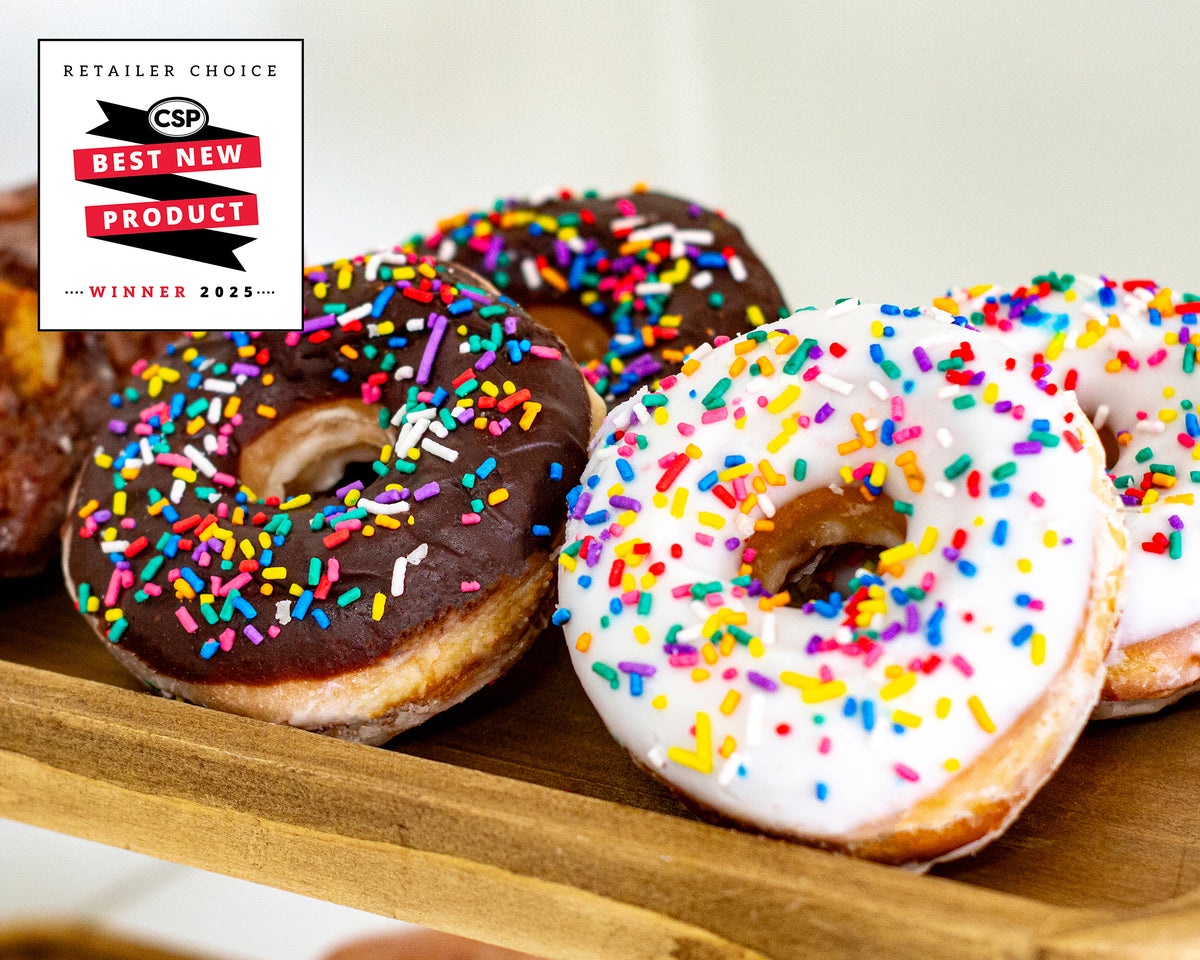 White Iced Sprinkled Yeast Donut | Prairie City Bakery